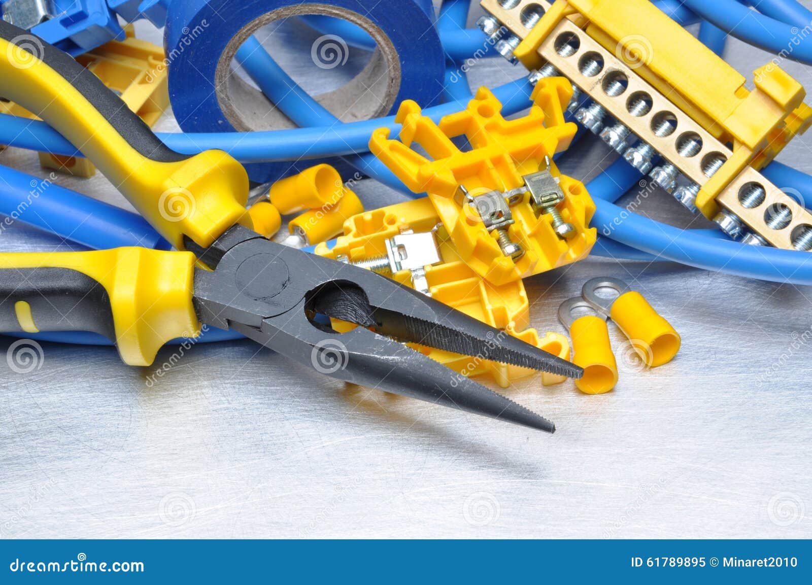 Pliers with Electrical Component Kit on Grey Metal Background Stock ...