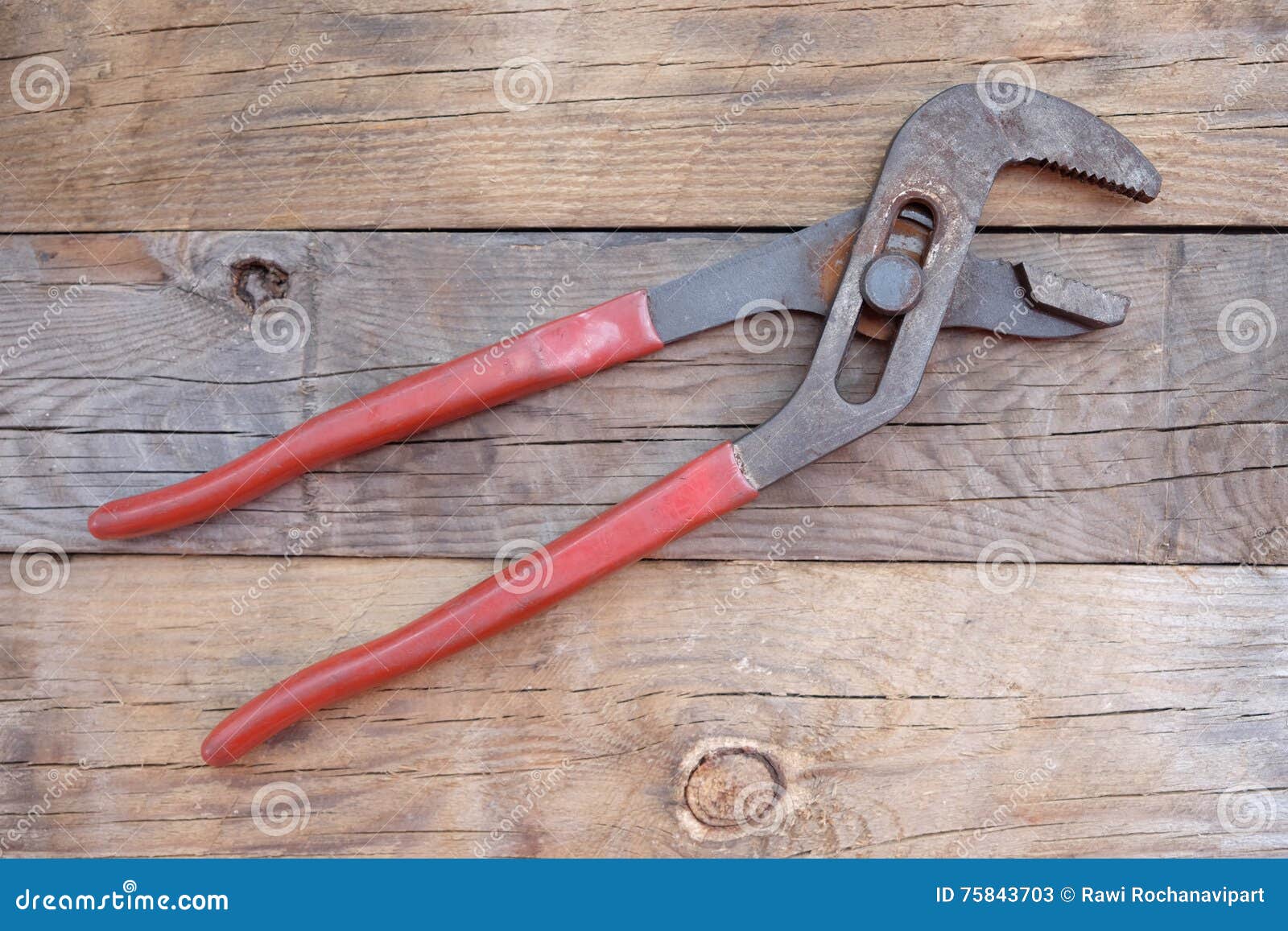 Pliers Red Handle Over a Wood Panel. Stock Image - Image of repair ...