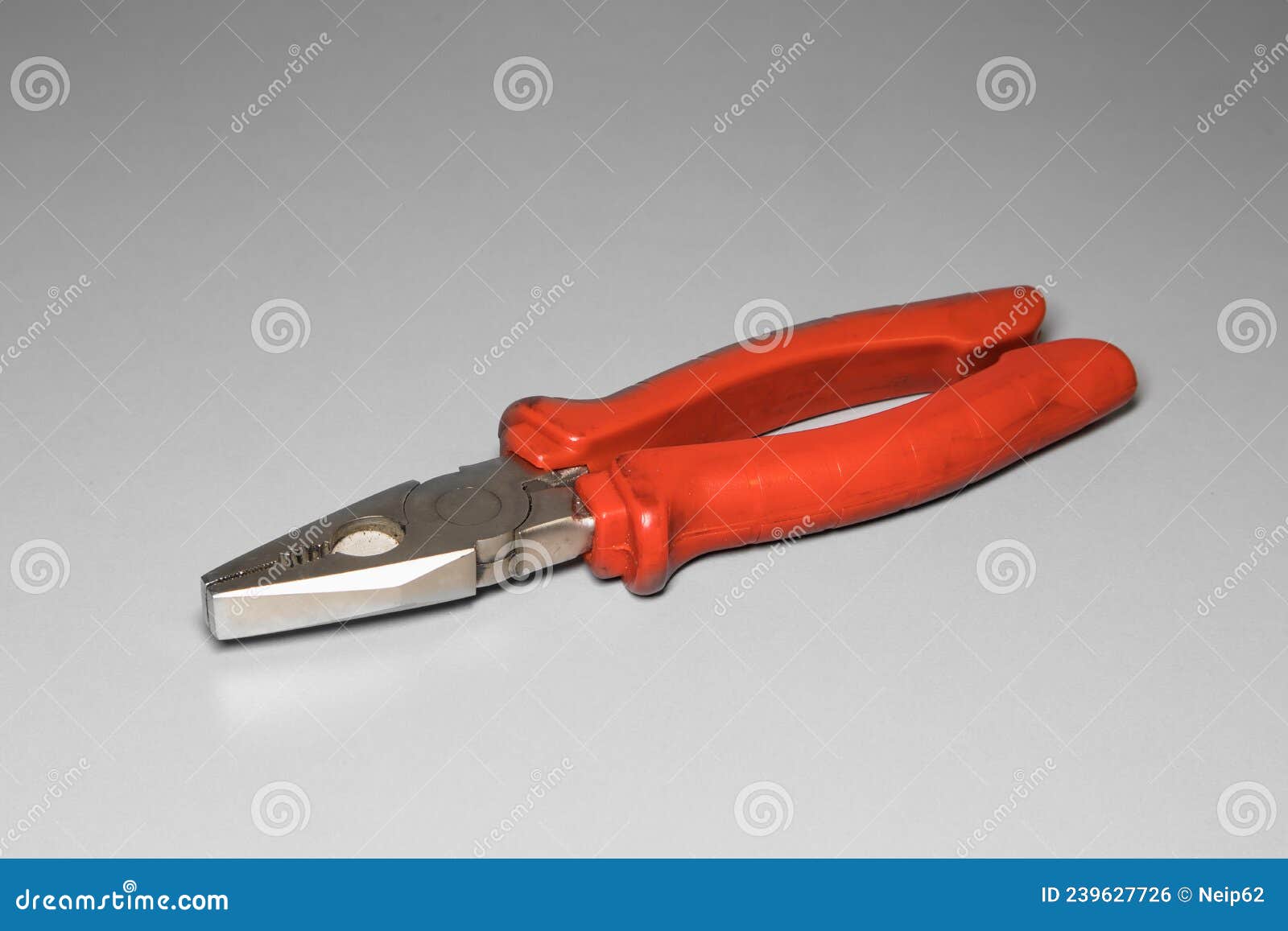 Pliers with Red Handles on the Table Close-up Stock Photo - Image of ...