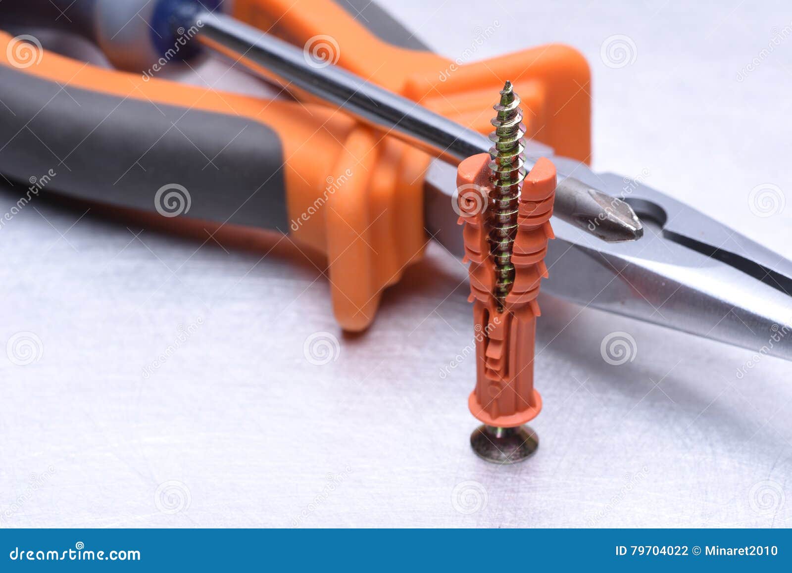 Pliers, Screwdriver and Dowel Stock Photo - Image of closeup, iron ...