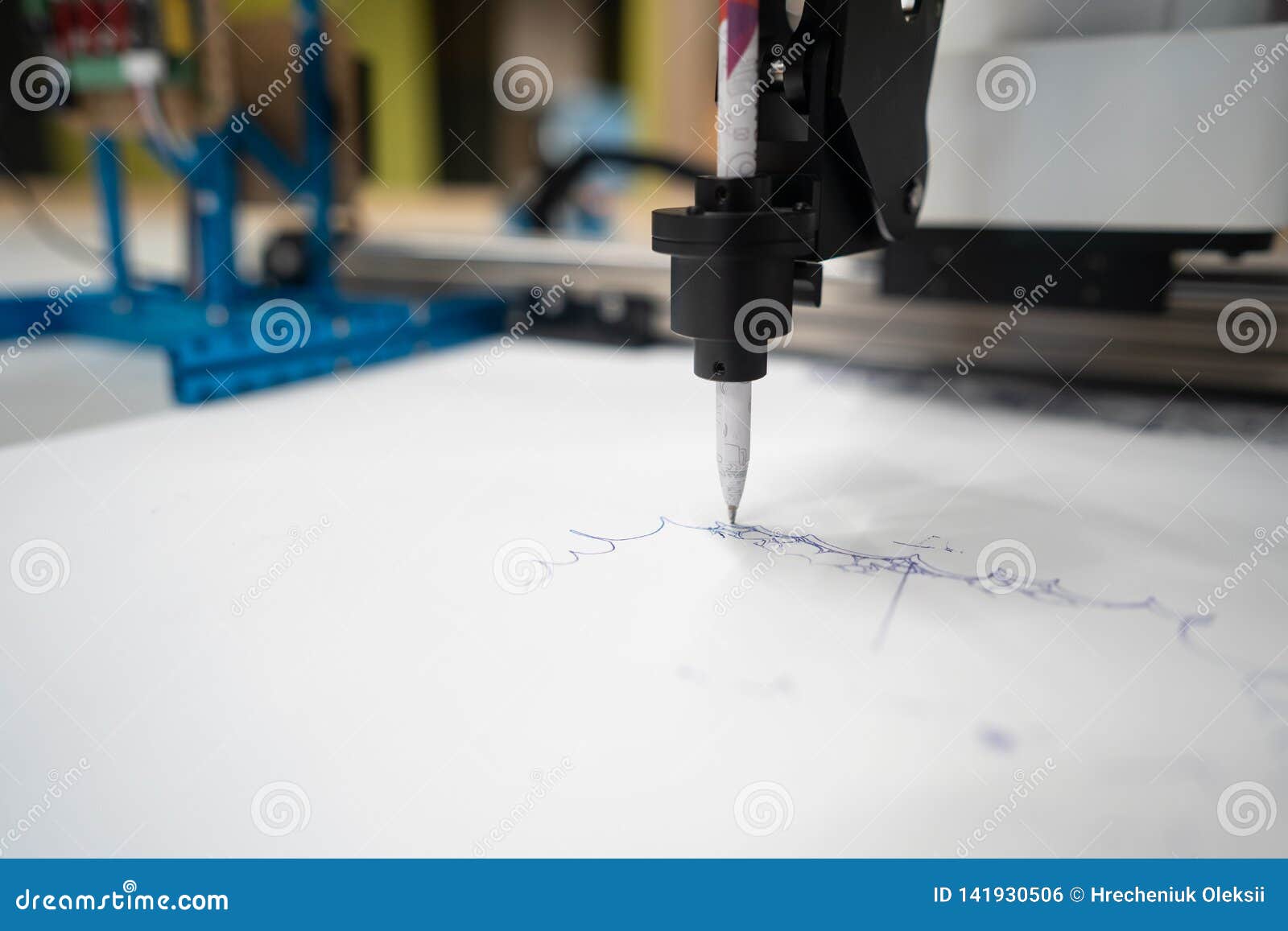 Plotter Draws a Pen Drawing on a Sheet of White Paper Stock Photo ...
