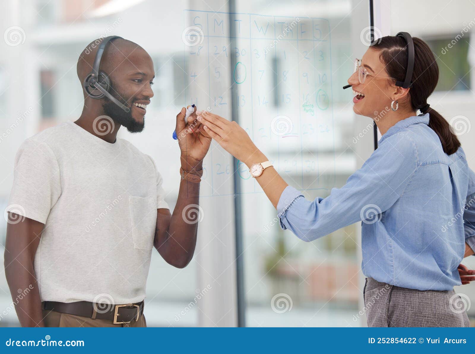 Plotting for Our Success. Two Business Colleagues Planning Their Work ...