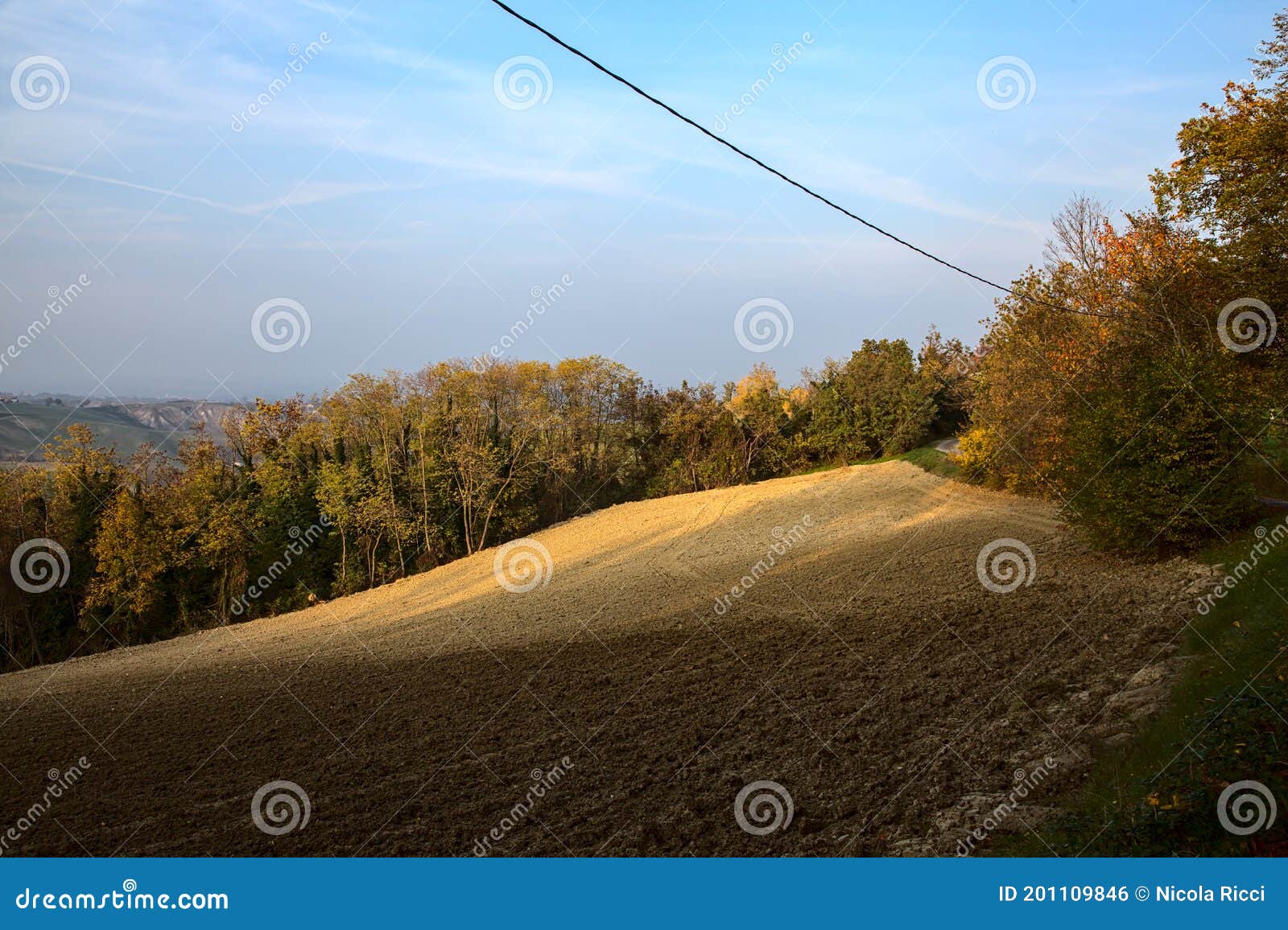 Ploughed Field on a Hill at Sunset in Autumn Stock Photo - Image of ...