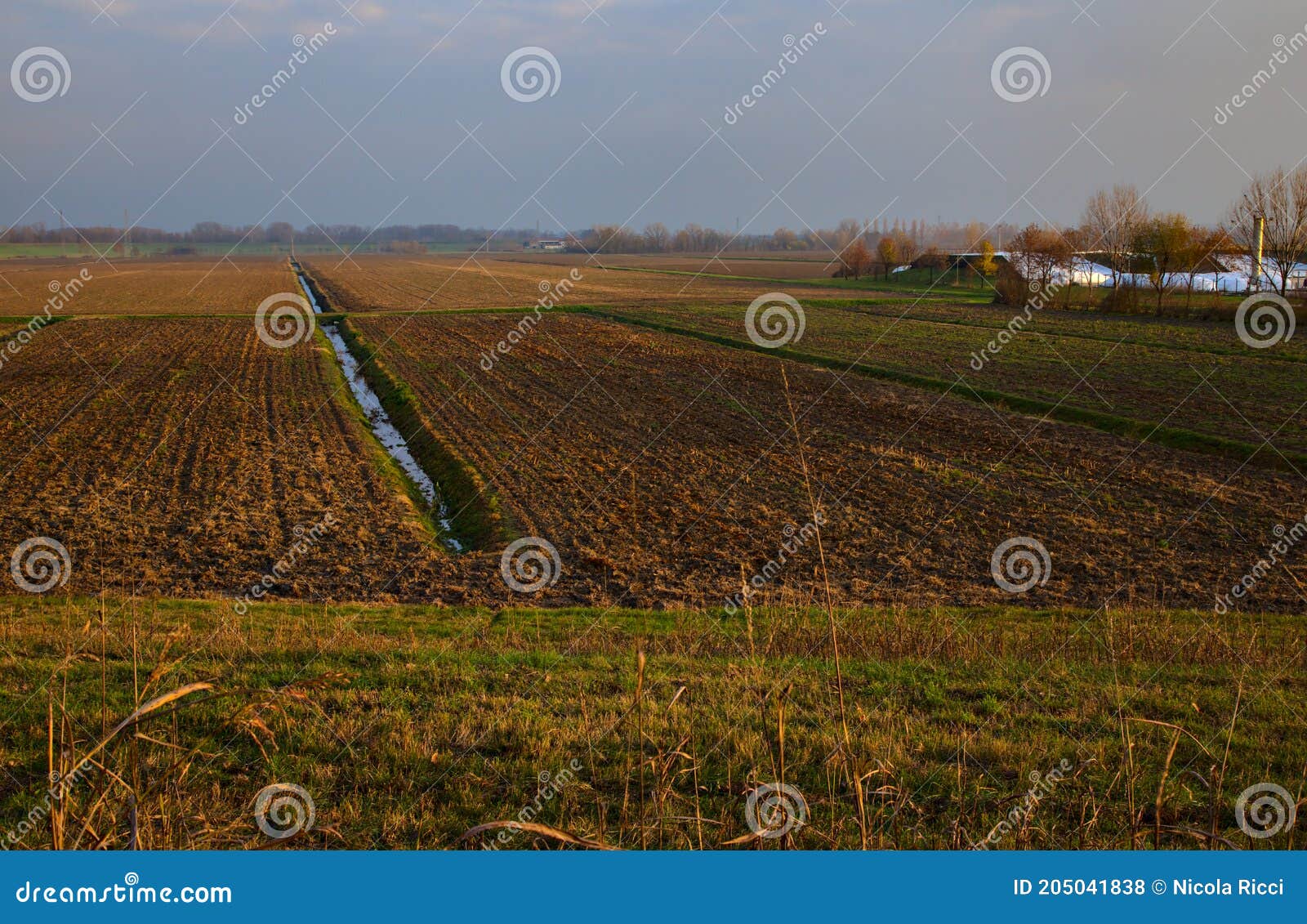 Ploughed Field with a Stream of Water at Sunset in Autumn Stock Photo ...
