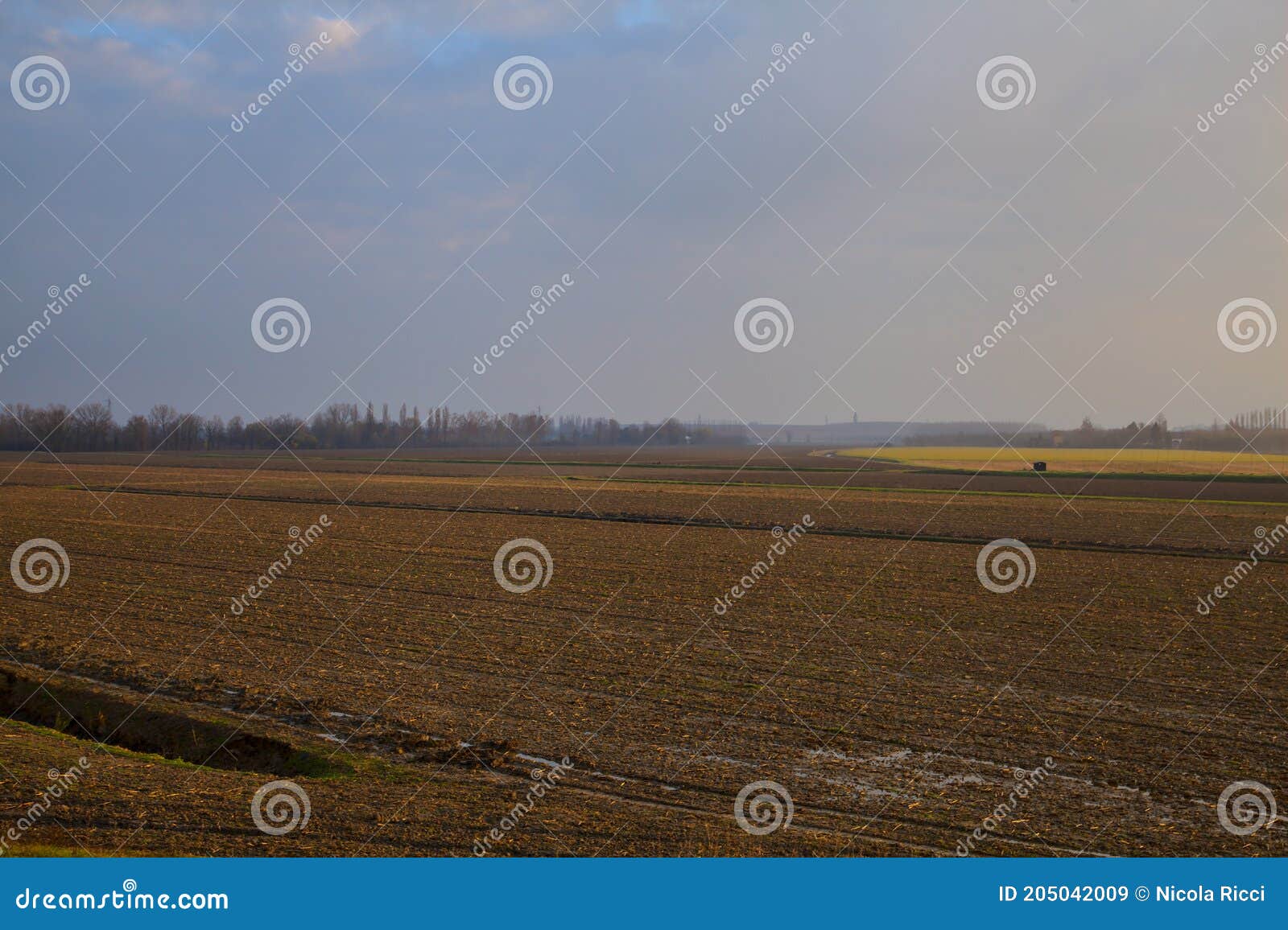 Ploughed Field with a Stream of Water at Sunset in Autumn Stock Image ...
