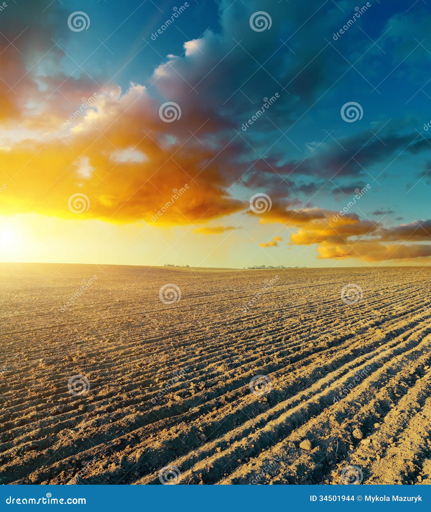 Ploughed field and sunset stock photo. Image of growth - 34501944