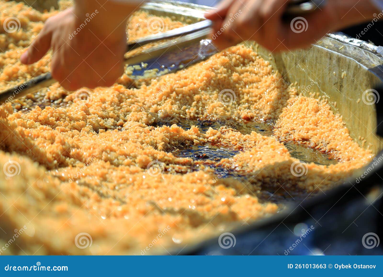 Plov in a large cauldron stock image. Image of good - 261013663