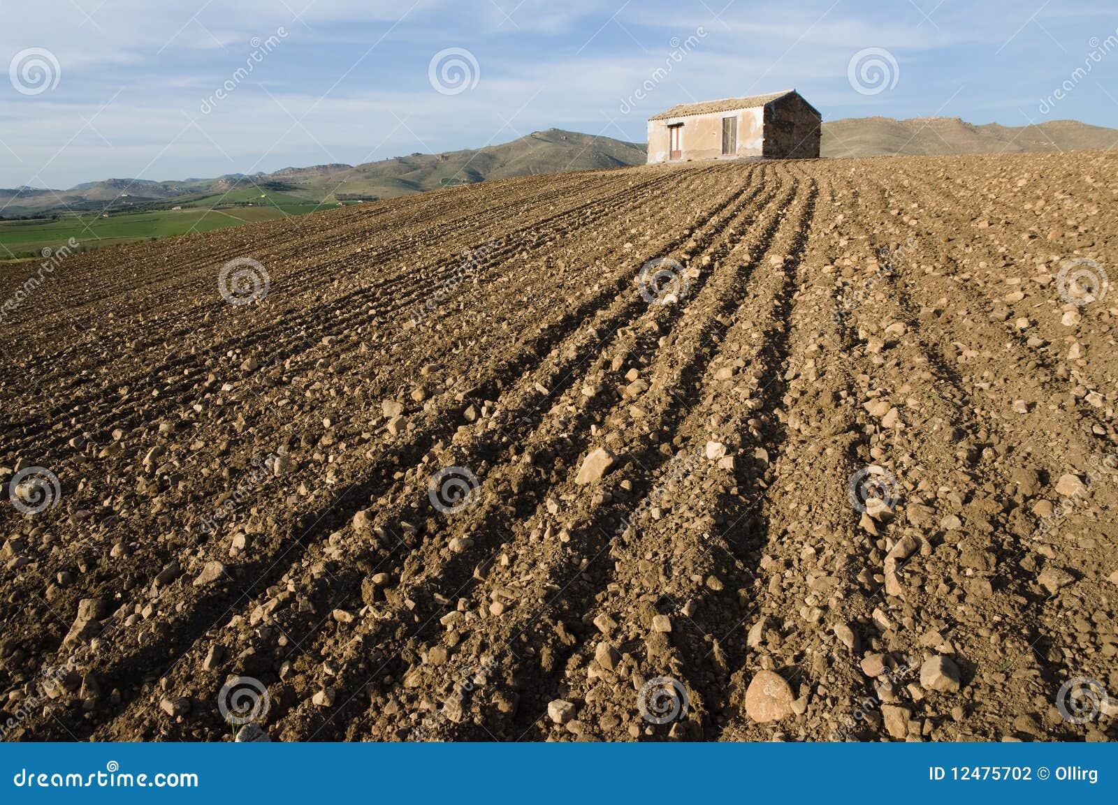 Plowed field stock photo. Image of cultivated, building - 12475702