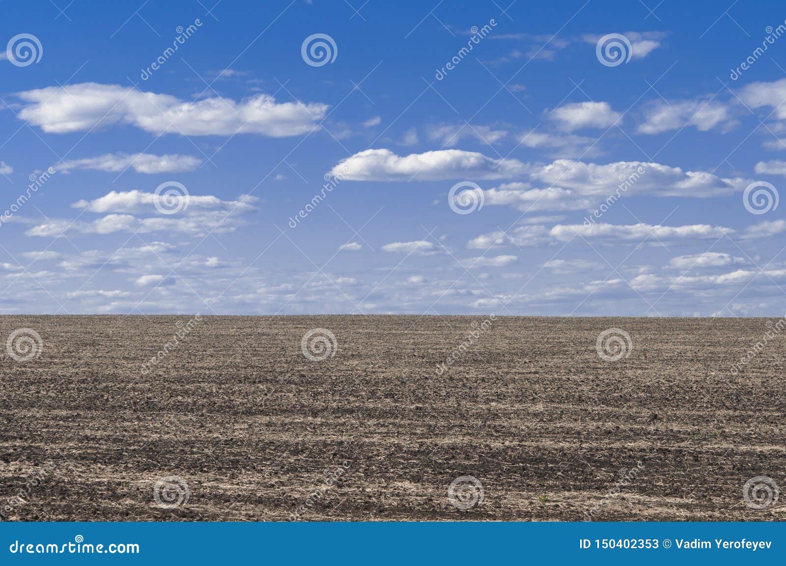 Plowed Field in Spring Time with Blue Sky Stock Image - Image of clouds ...