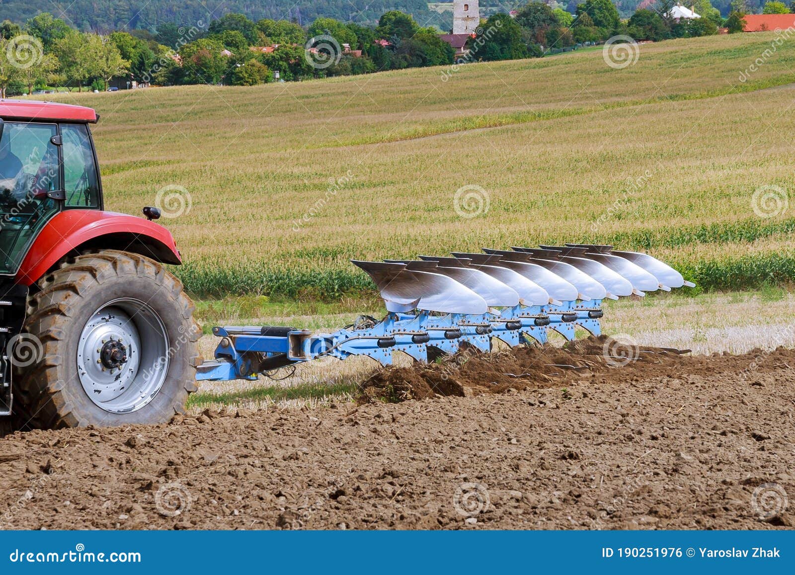 Plowing the Field. Large Plow on a Tractor. Tractor with Agricultural ...