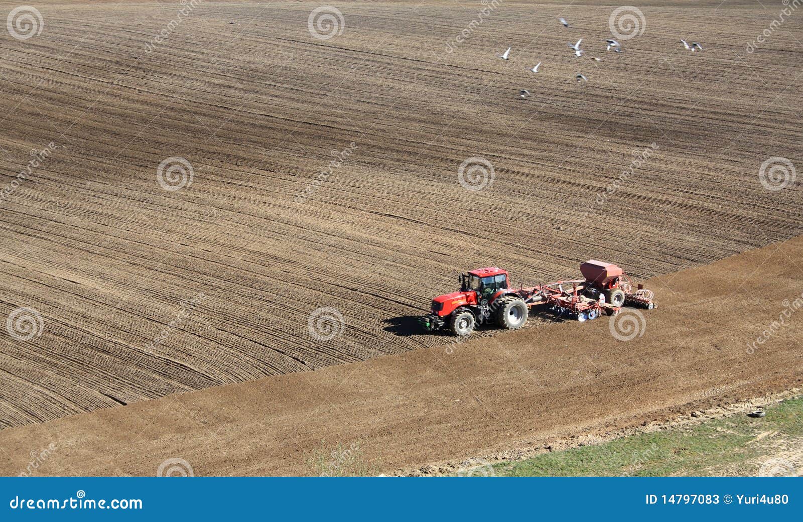 A plowing tractor stock image. Image of horizontal, land - 14797083
