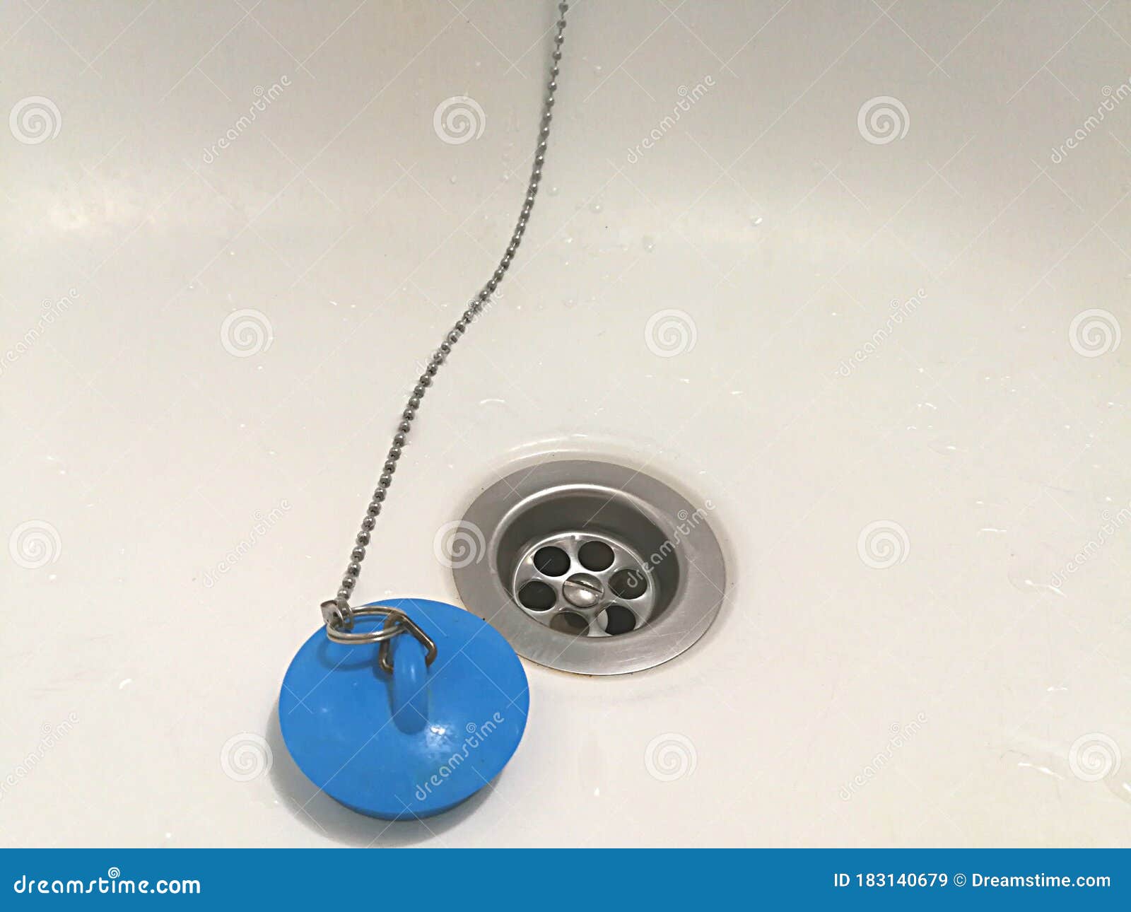 Plug in the Bathroom on a Chain Stock Image - Image of chain, drain ...
