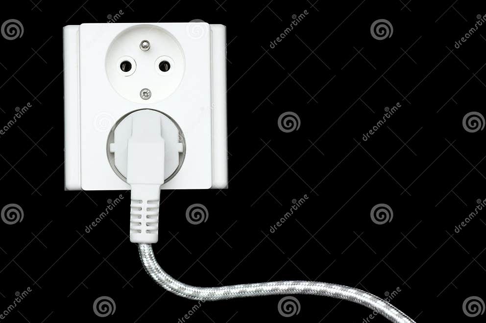 Plug is Plugged into an Electrical Outlet. Stock Image - Image of ...