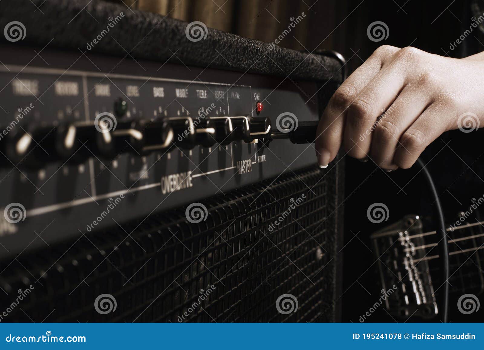 Plugging Cable into Amplifier Stock Photo - Image of enjoyment ...