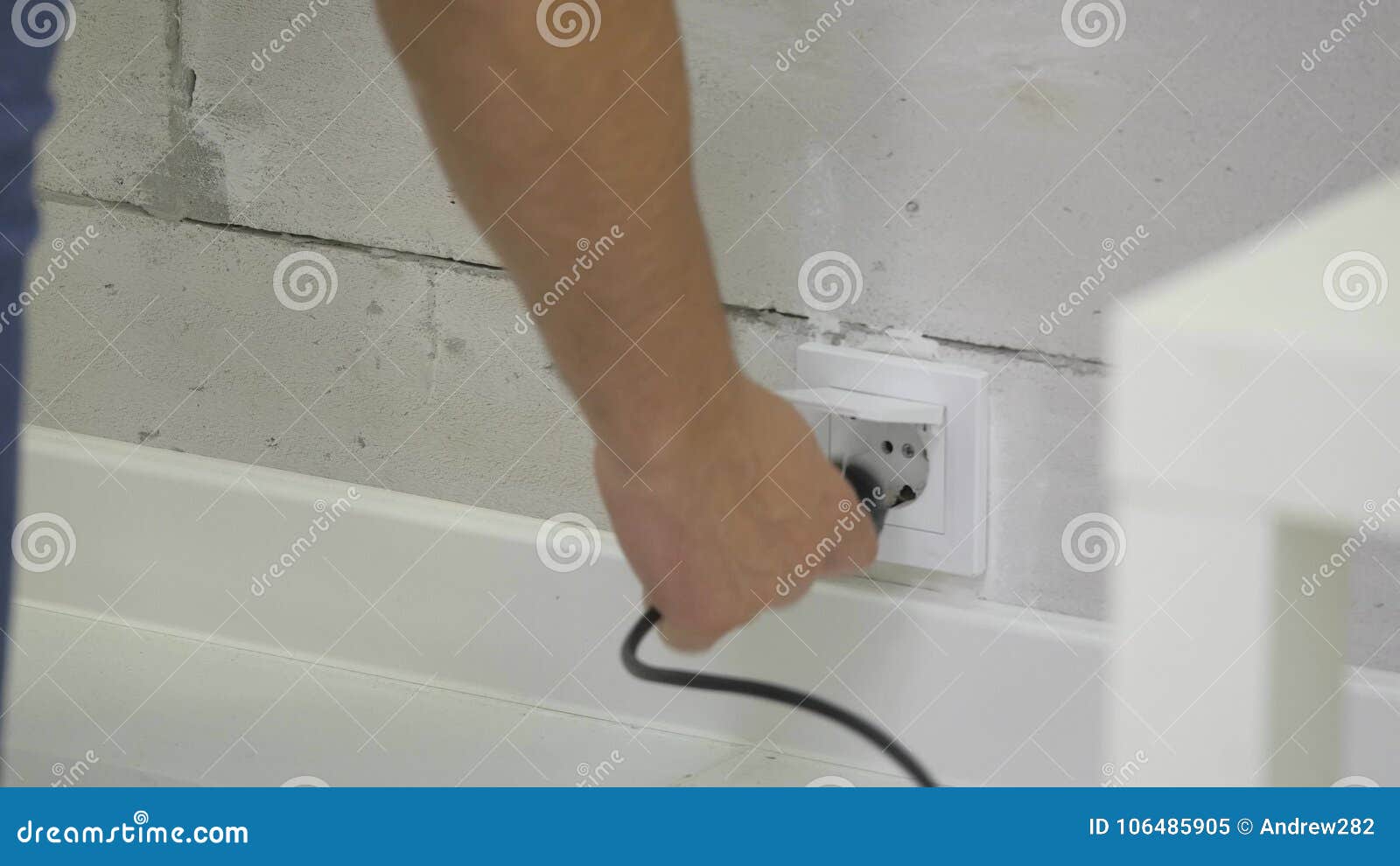 Plugging a Electrical Cord Cable into Wall AC Socket Stock Video ...