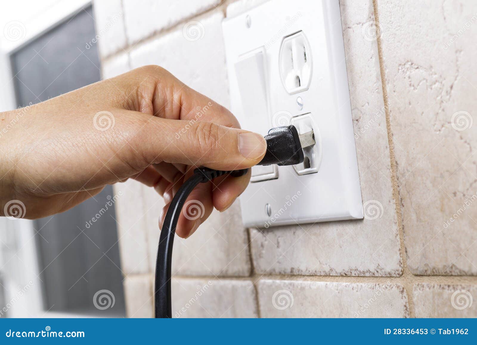 Plugging into Electrical Outlet Stock Image - Image of white, tile ...