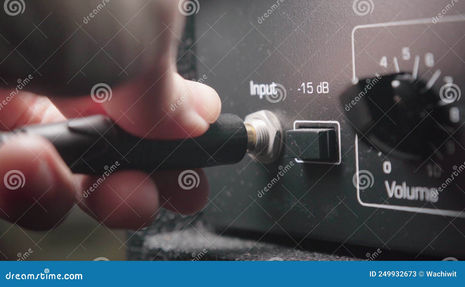 Plugging an Instrument Cable into a Guitar Amplifier Stock Video ...