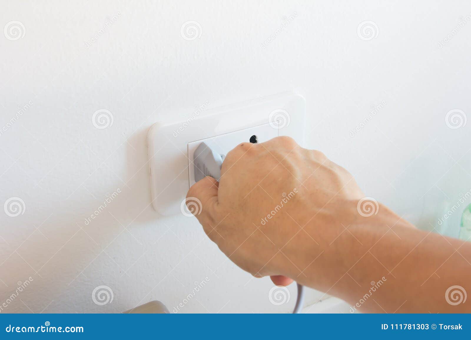 Plugging a power stock image. Image of close, cable - 111781303