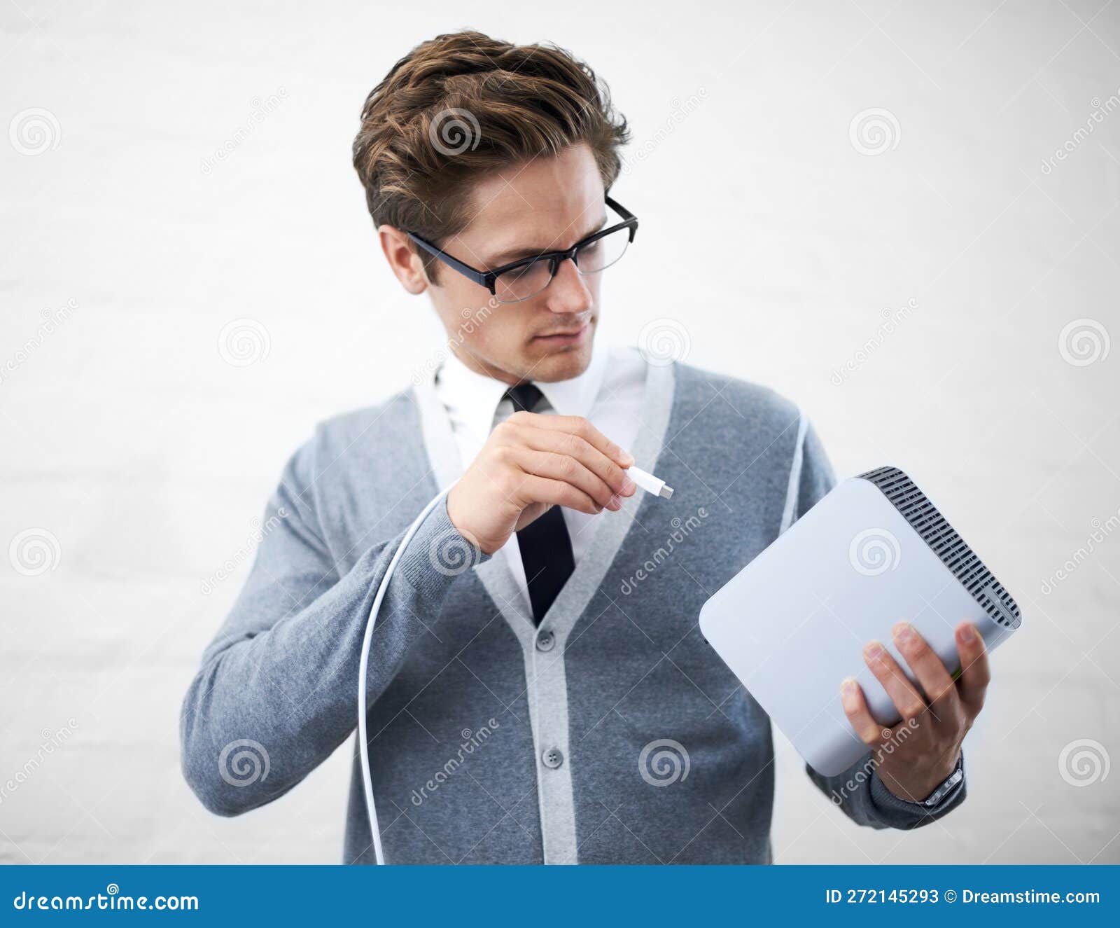 Plugging in To More Virtual Space. a Young Nerdy Guy Plugging in a Hard ...