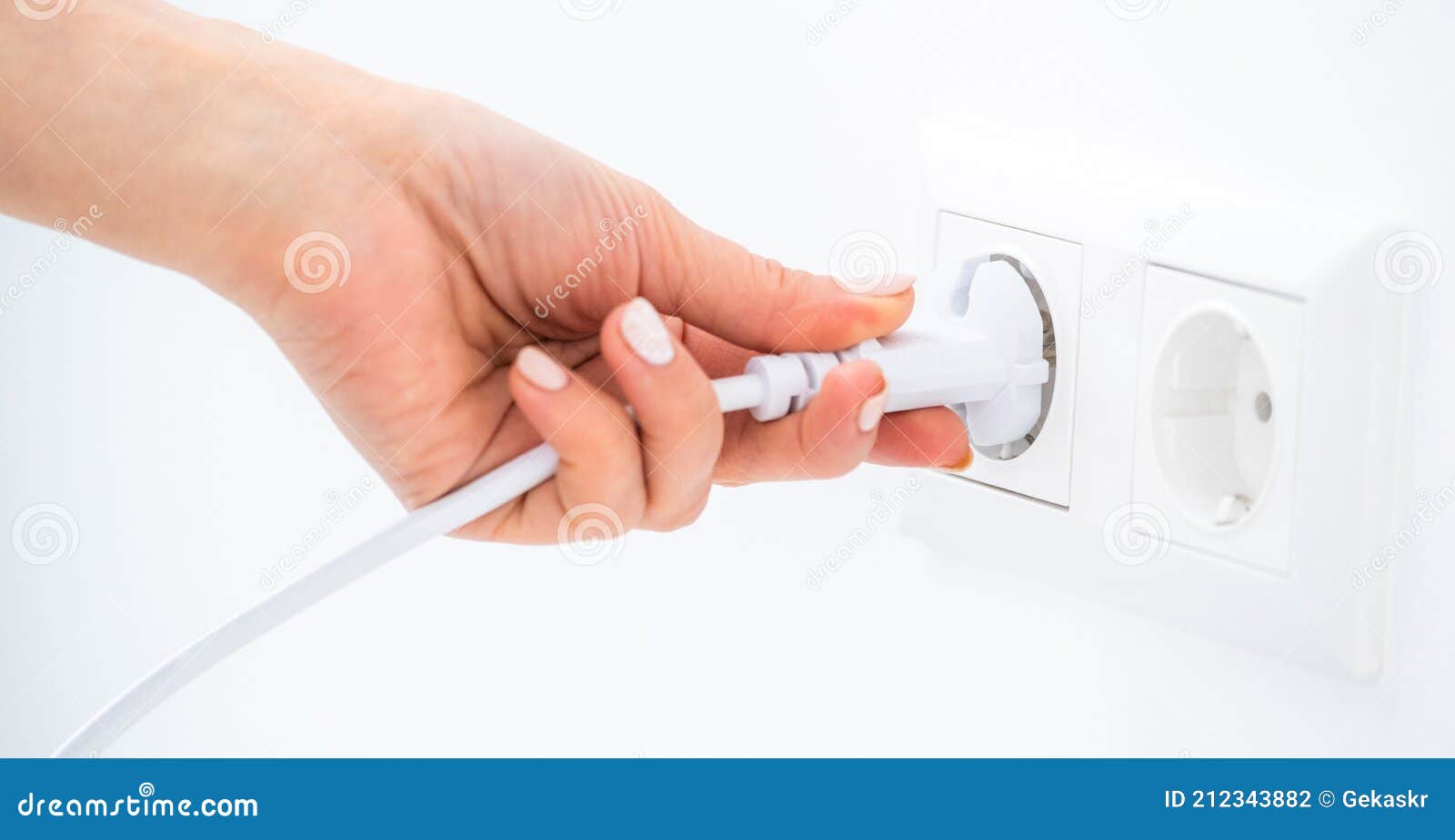 Plugging wire into socket stock photo. Image of energy - 212343882