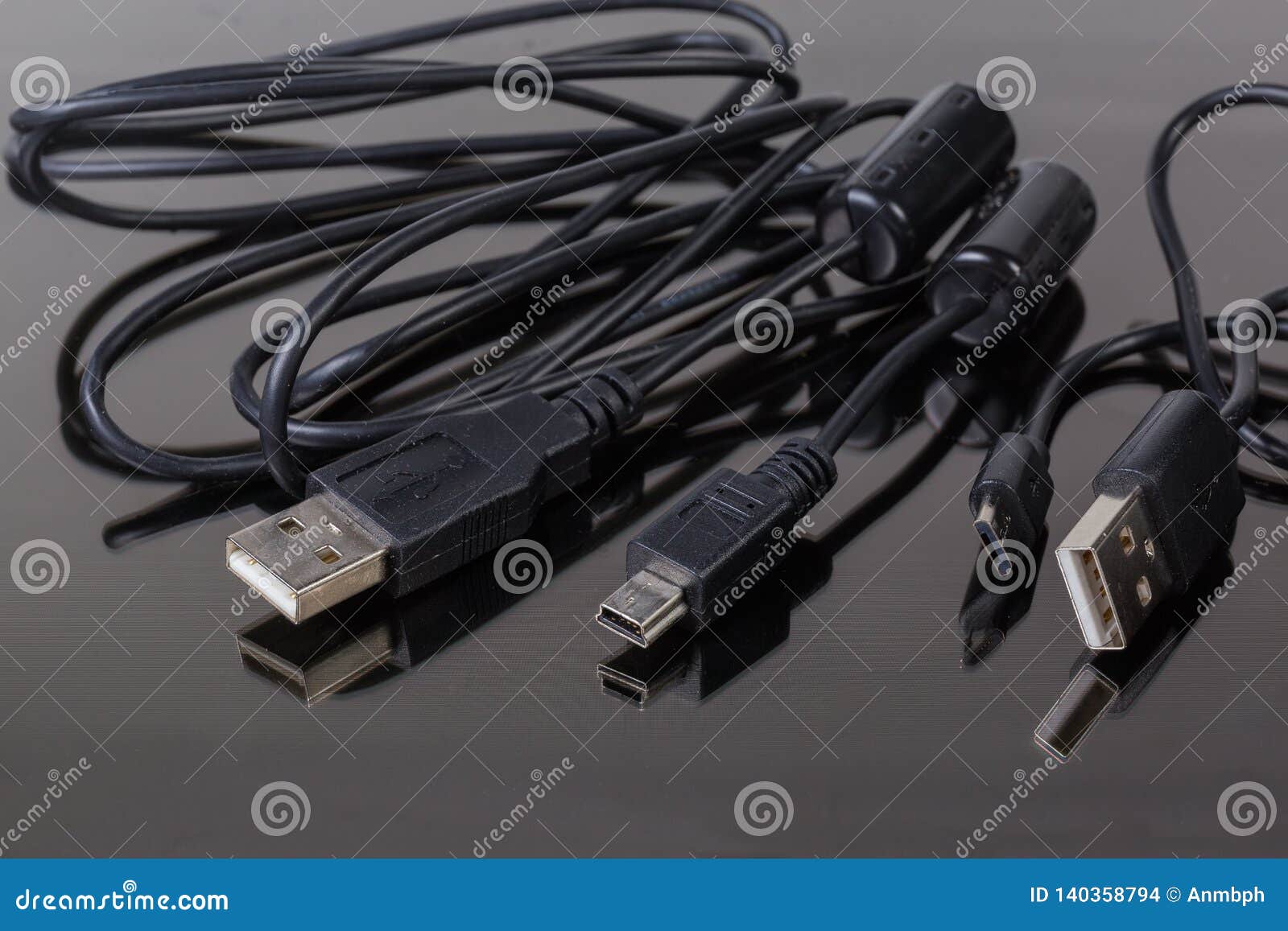 Plugs USB, Micro-USB and Mini-USB on Cables Edges Stock Photo - Image ...
