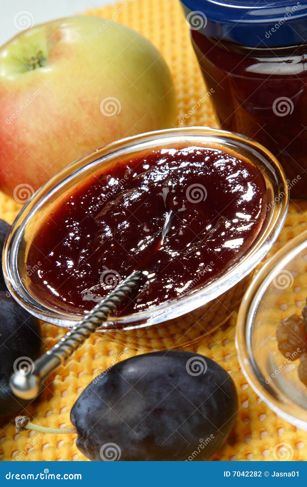 Plum Jam and Raisins in Glass Bowl Stock Photo - Image of condiment ...