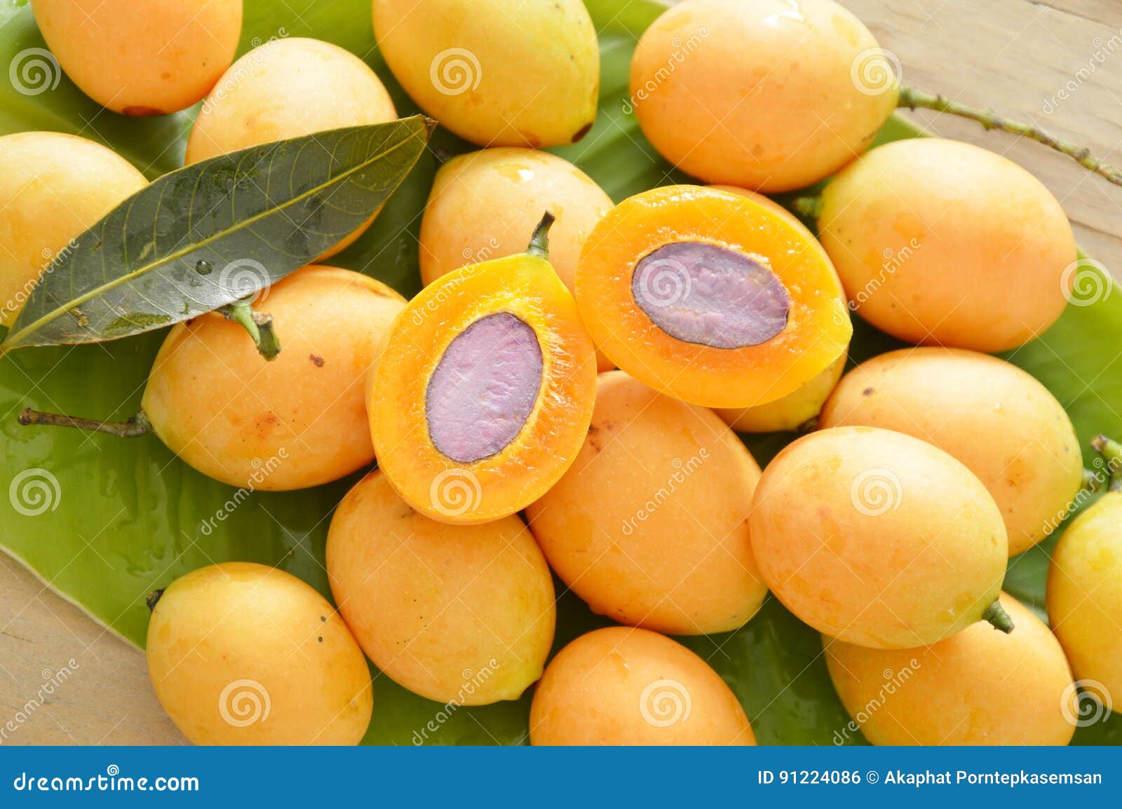 Plum Mango Tropical Fruit Produced in Summer Half Cut on Banana Leaf ...