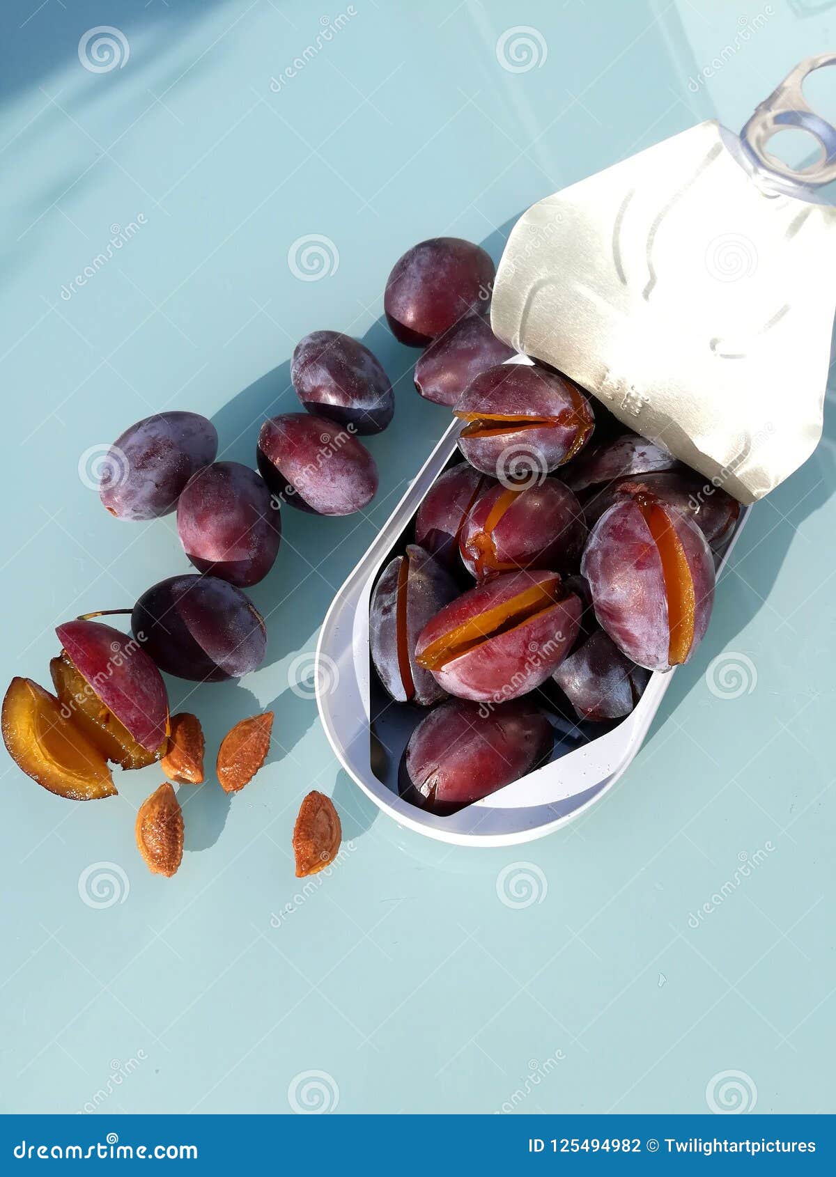 Plum pitter in action stock photo. Image of prunes, action - 125494982