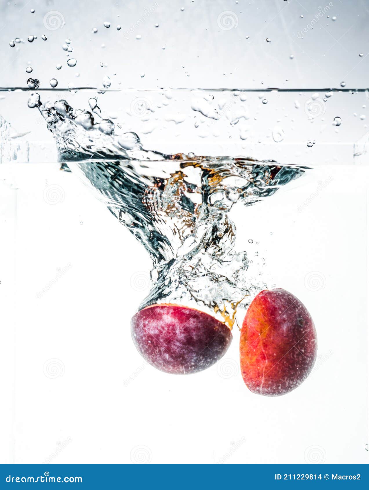 Plum in Water with Splash and Cut in Half Stock Photo - Image of plant ...