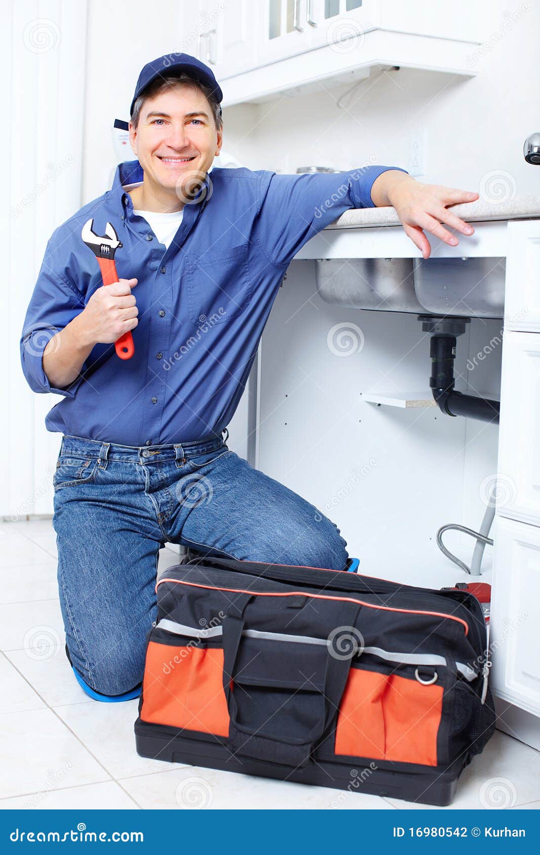 Plumber stock photo. Image of professional, kitchen, mature - 16980542