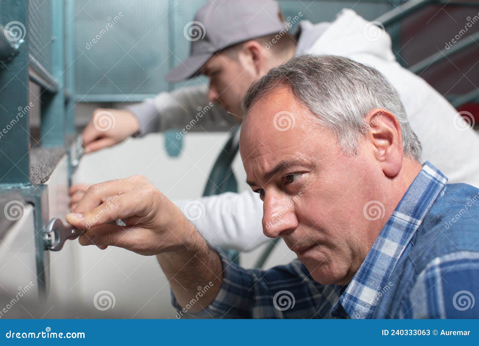 Plumber with Apprentice Learning Trade Stock Image - Image of feed ...