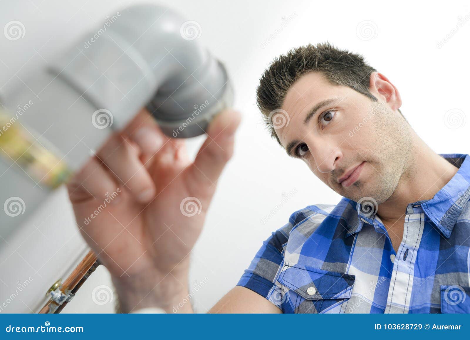 Plumber Checking Plastic Pipe Stock Image - Image of kitchen, service ...