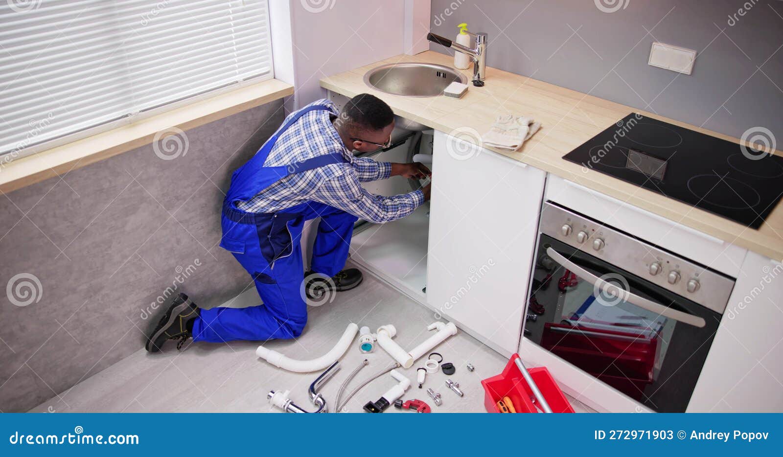 Plumber Cleaning Kitchen Drain and Pipe Stock Image - Image of ...