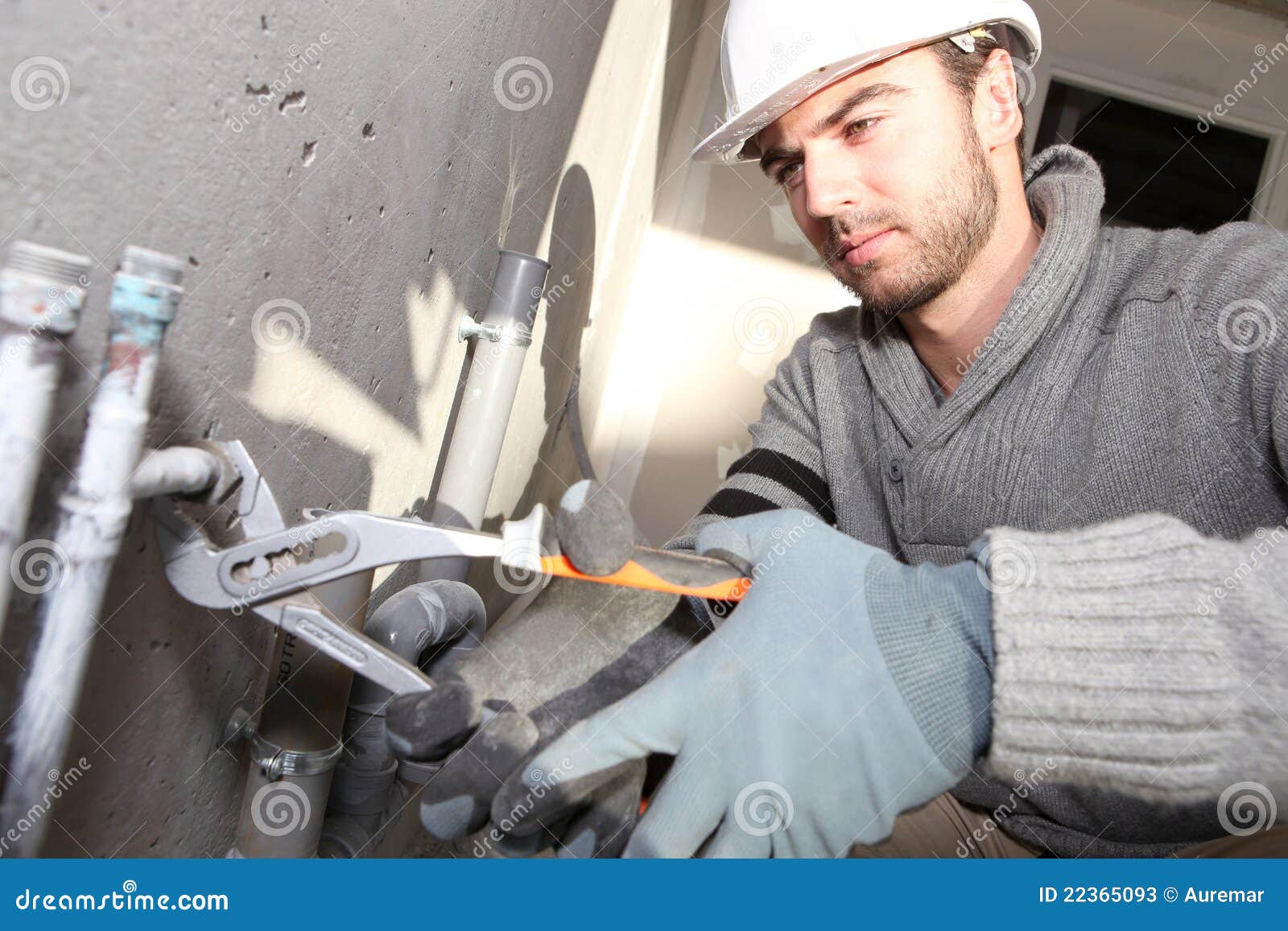 Plumber on Constructor Site Stock Image - Image of central, scale: 22365093