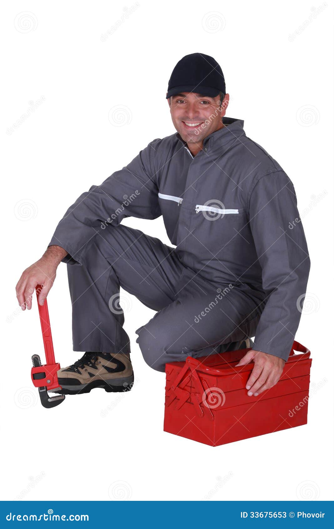 Plumber crouching stock image. Image of service, boots - 33675653
