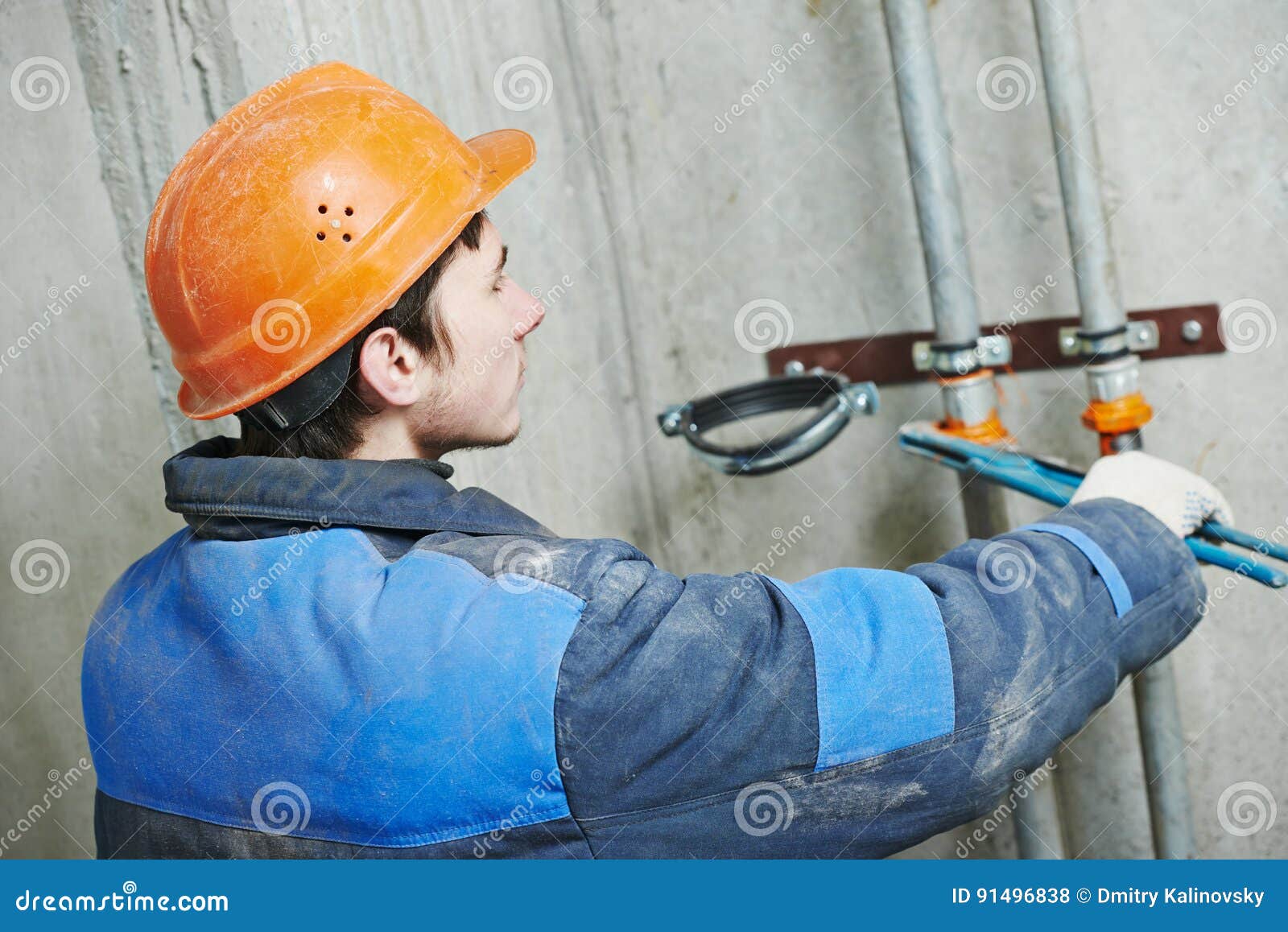 Plumber engineer worker stock photo. Image of controlling - 91496838
