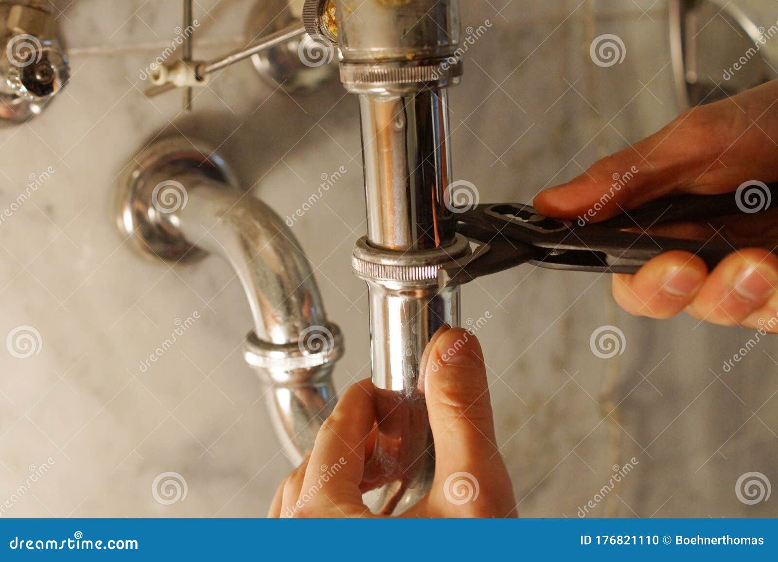 Plumber fixing drain stock photo. Image of hand, inspection - 176821110
