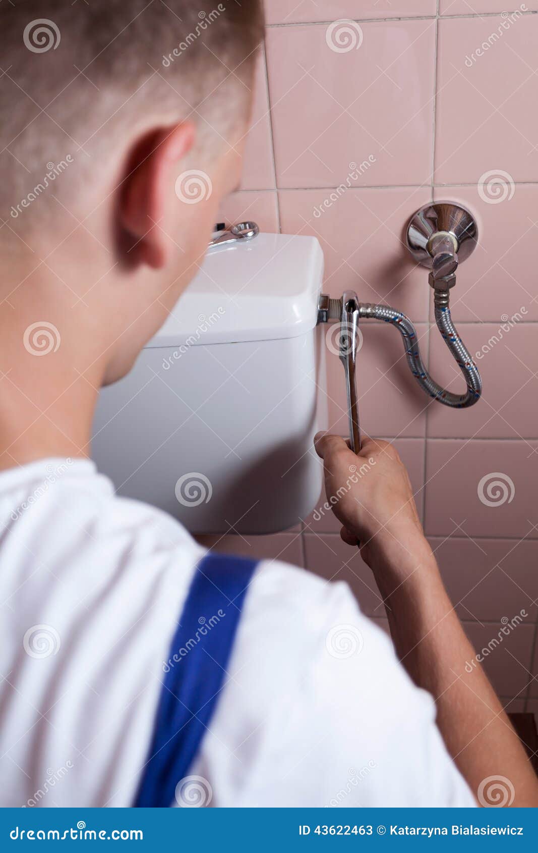 Plumber Fixing a Flush Toilet Stock Image - Image of profession, hose ...