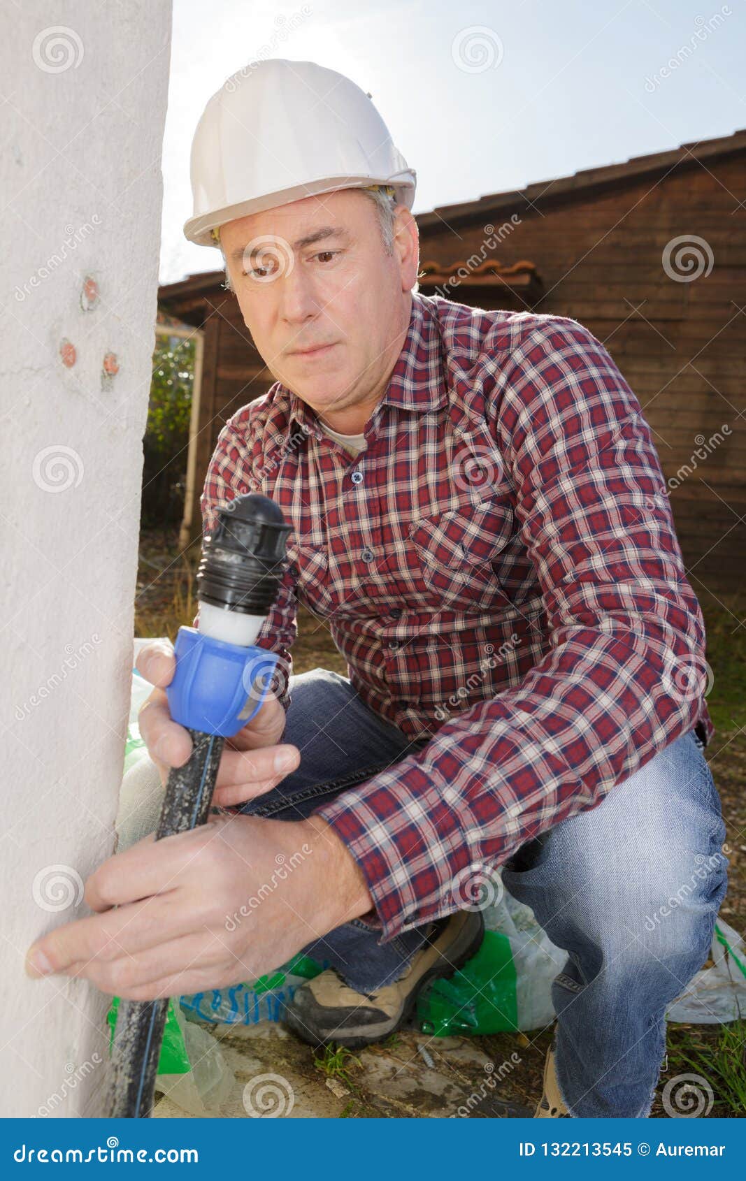 Plumber Fixing Sewerage Pipe at Construction Site Stock Image - Image ...