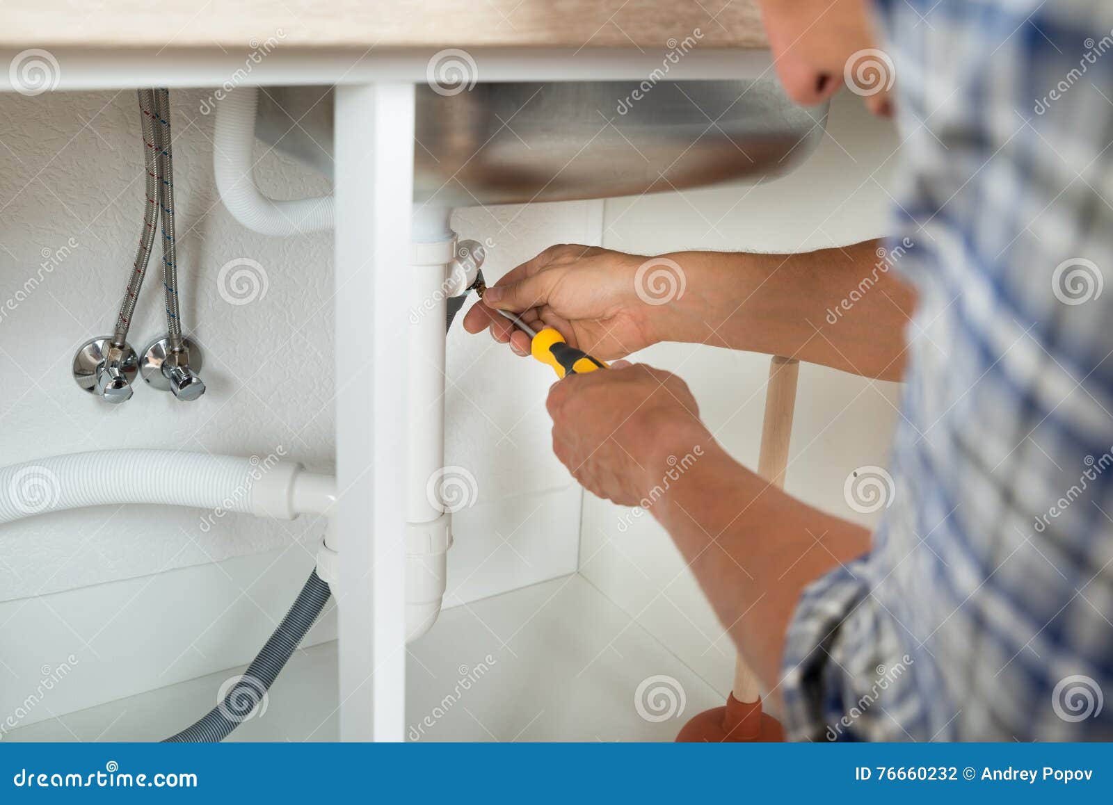 Plumber Fixing Sink Pipe with Screwdriver Stock Photo - Image of ...