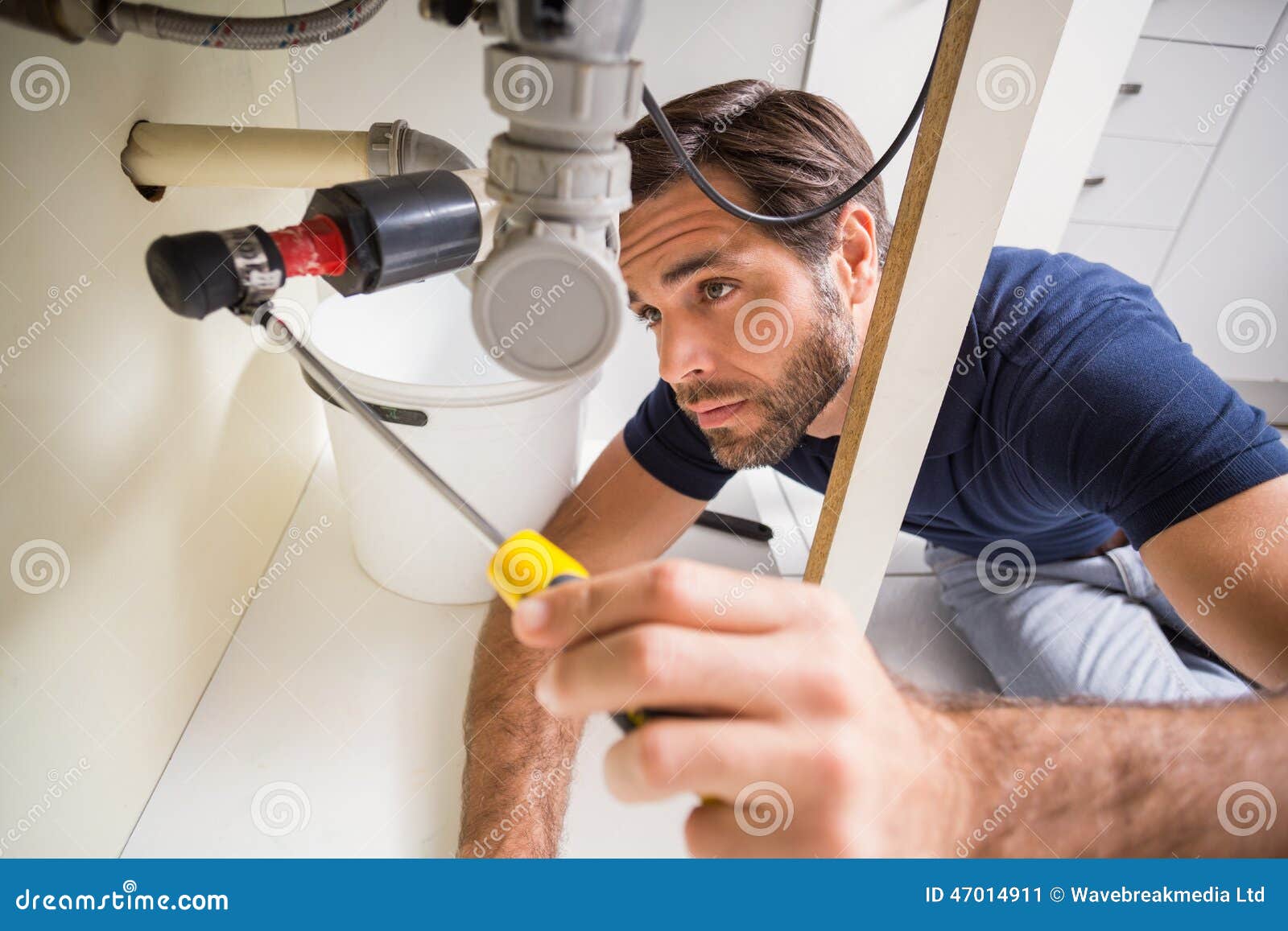 Plumber Fixing Under the Sink Stock Image - Image of caucasian ...