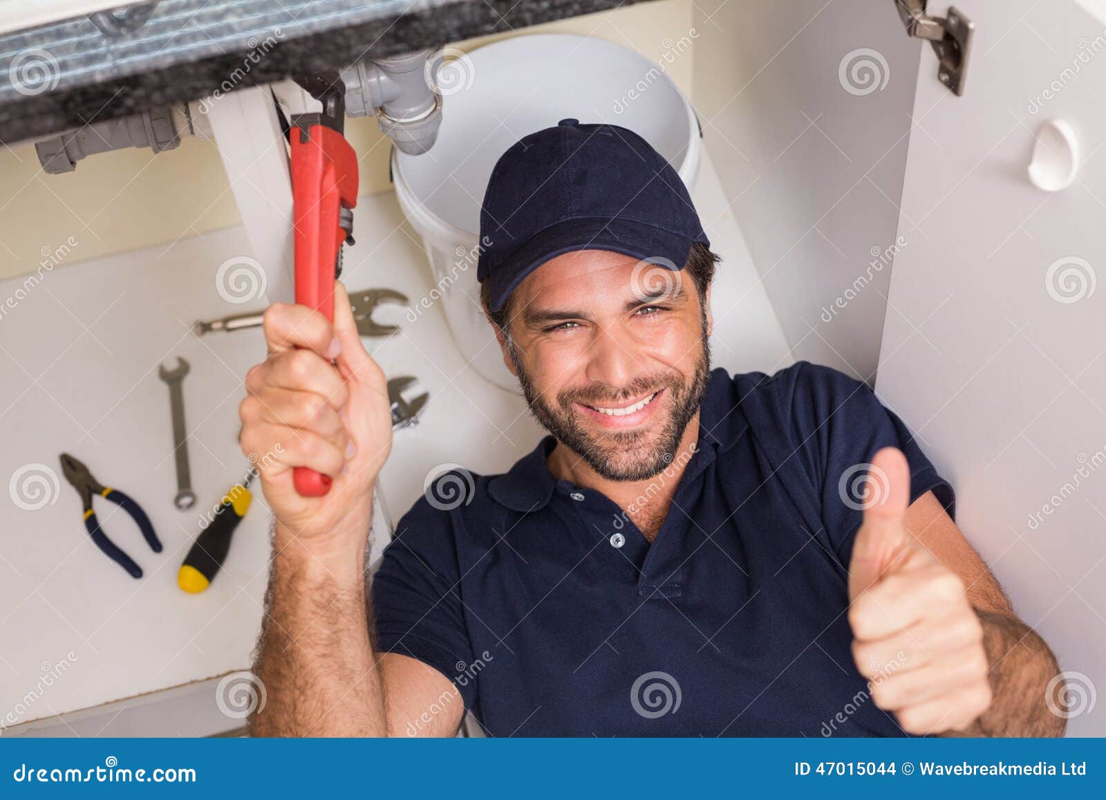 Plumber Fixing Under the Sink Stock Photo - Image of plumbing, repair ...