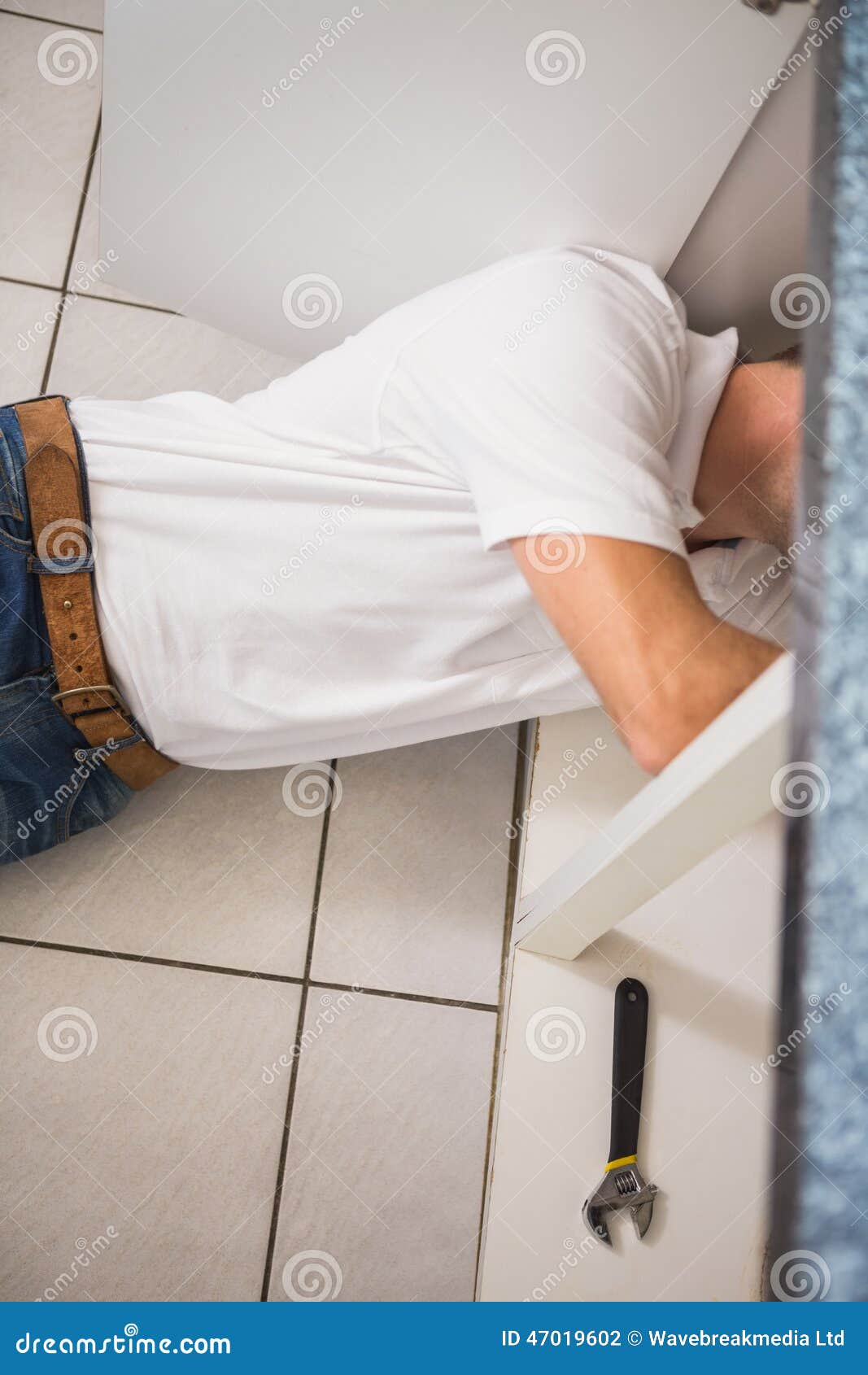 Plumber Fixing Under the Sink Stock Photo - Image of male, plumber ...