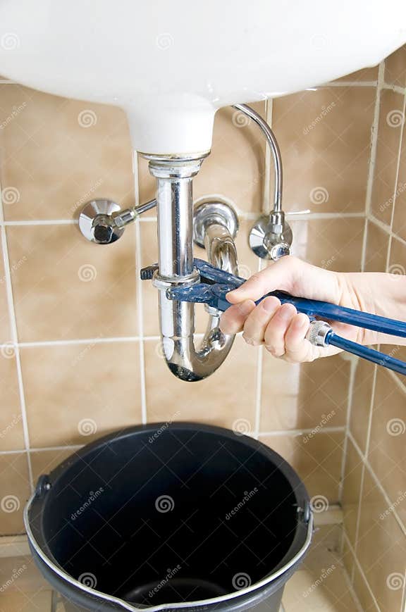 Plumber hand stock photo. Image of tradesman, pliers - 16555460