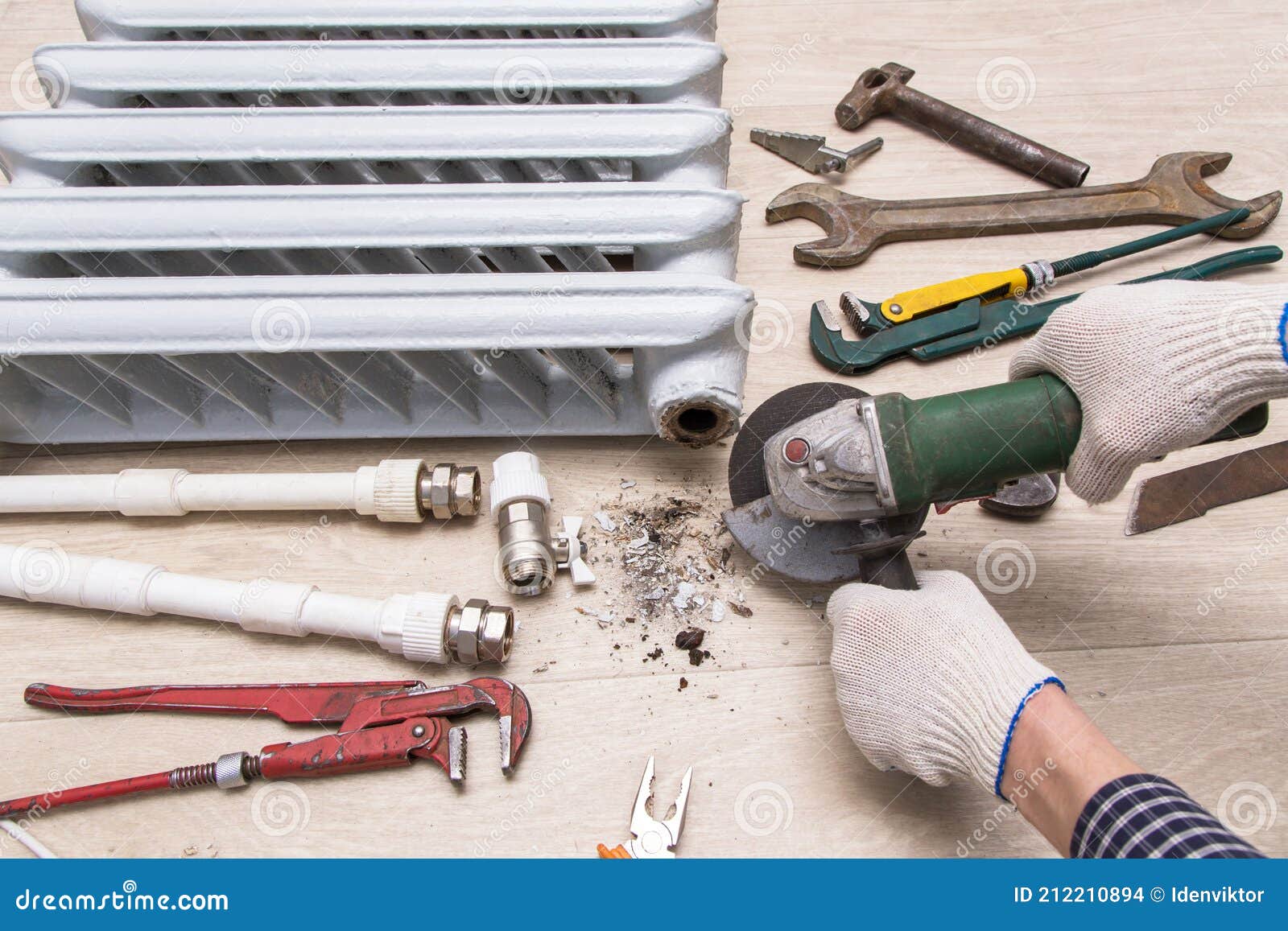 Plumber Hands Repairing Valve of Broken Radiator Central Heating with ...