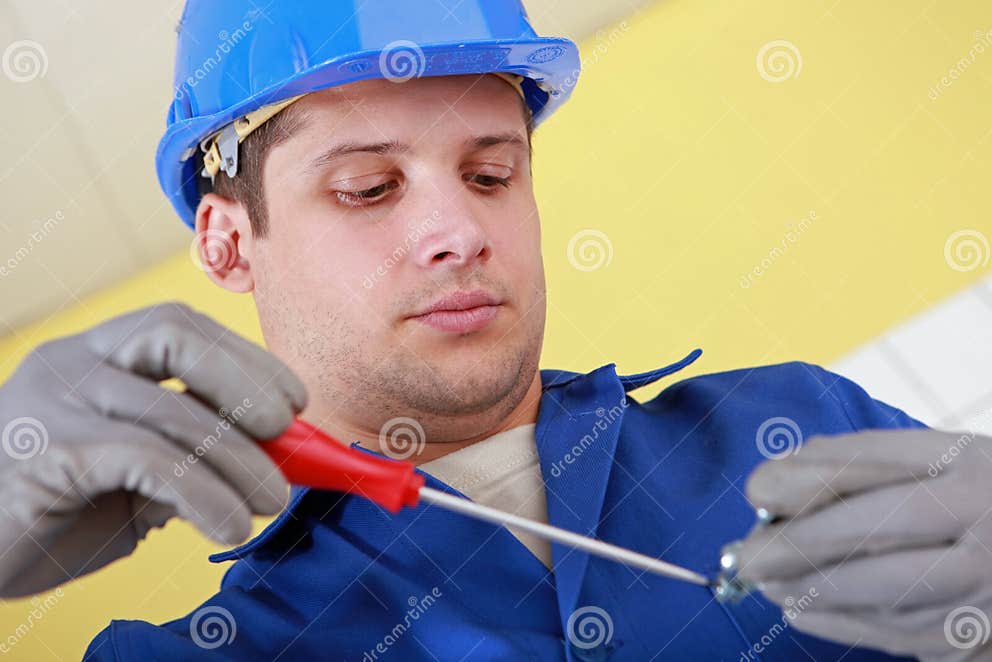 Plumber hard at work stock image. Image of construction - 35514733