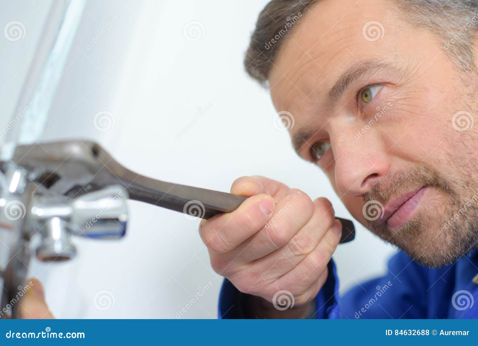 Plumber Hard at Work on Job Stock Photo - Image of construction, remote ...