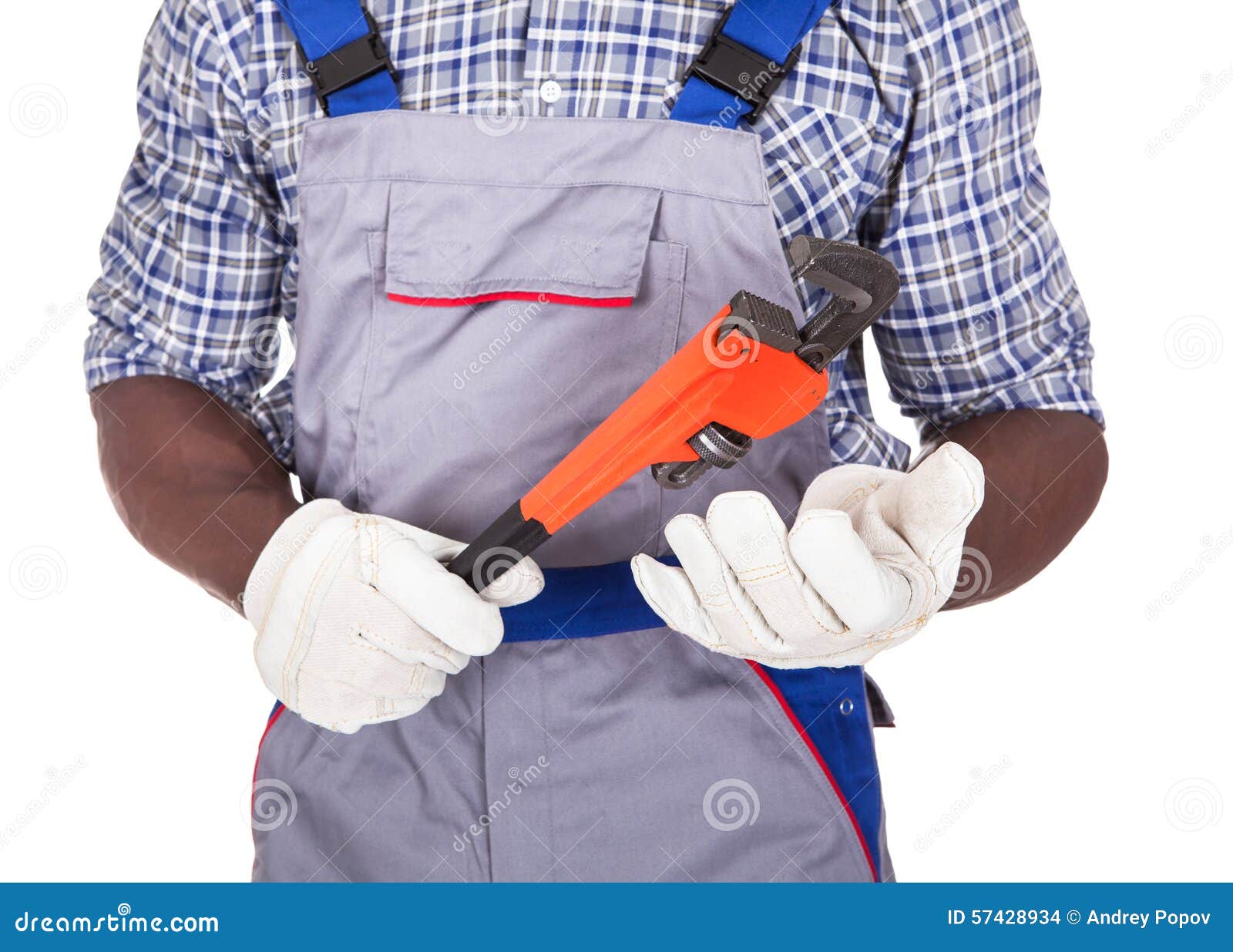 Mad Plumber Holding Steel Wrench In Closeup Stock Photo | CartoonDealer ...