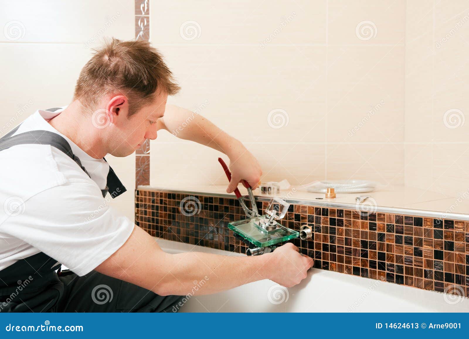 Plumber Installing a Mixer Tap in a Bathroom Stock Image - Image of ...