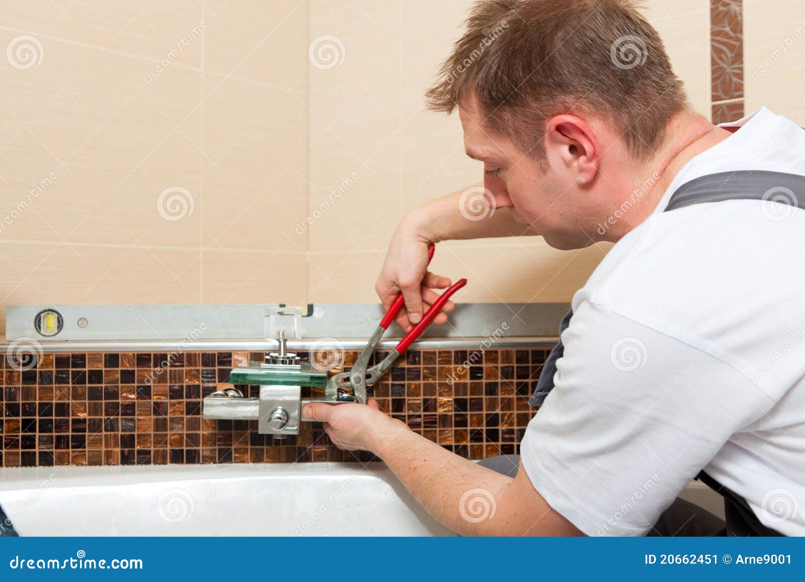 Plumber Installing a Mixer Tap in a Bathroom Stock Image - Image of ...